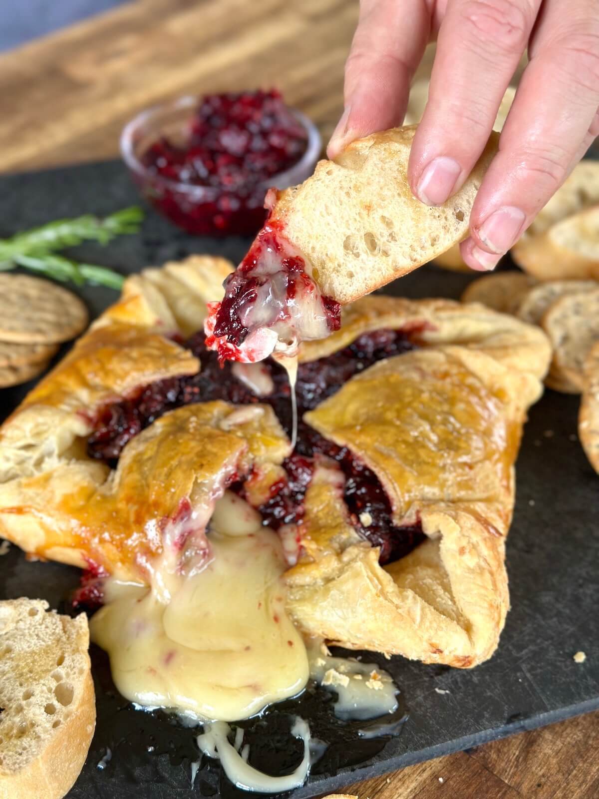Smoked Brie with Jalapeno Cranberry Sauce | Pellets and Pits