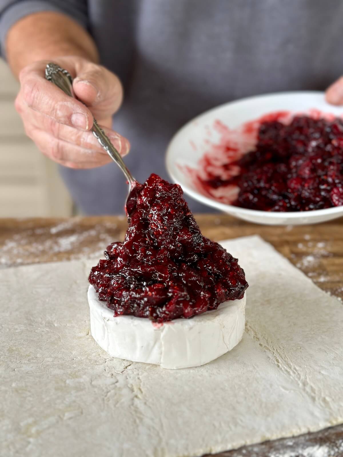 Smoked Brie with Jalapeno Cranberry Sauce | Pellets and Pits